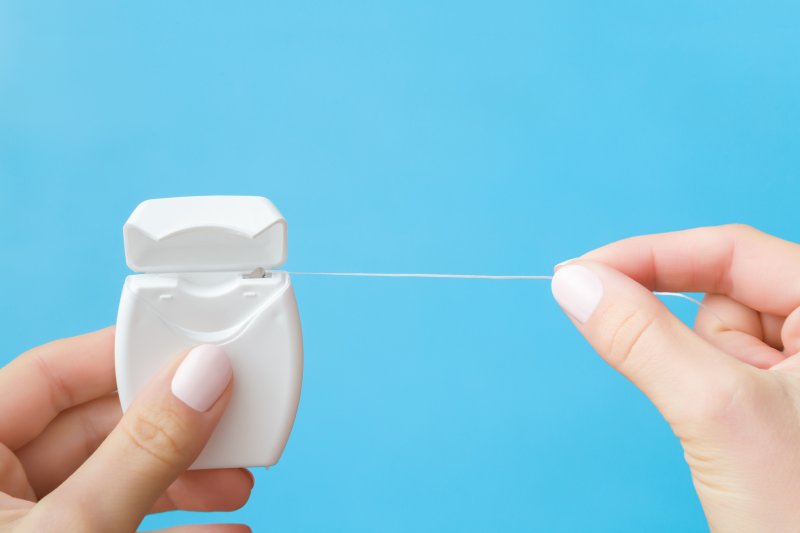 How to Floss More Often for Your New Year’s Resolution - DeMartino ...